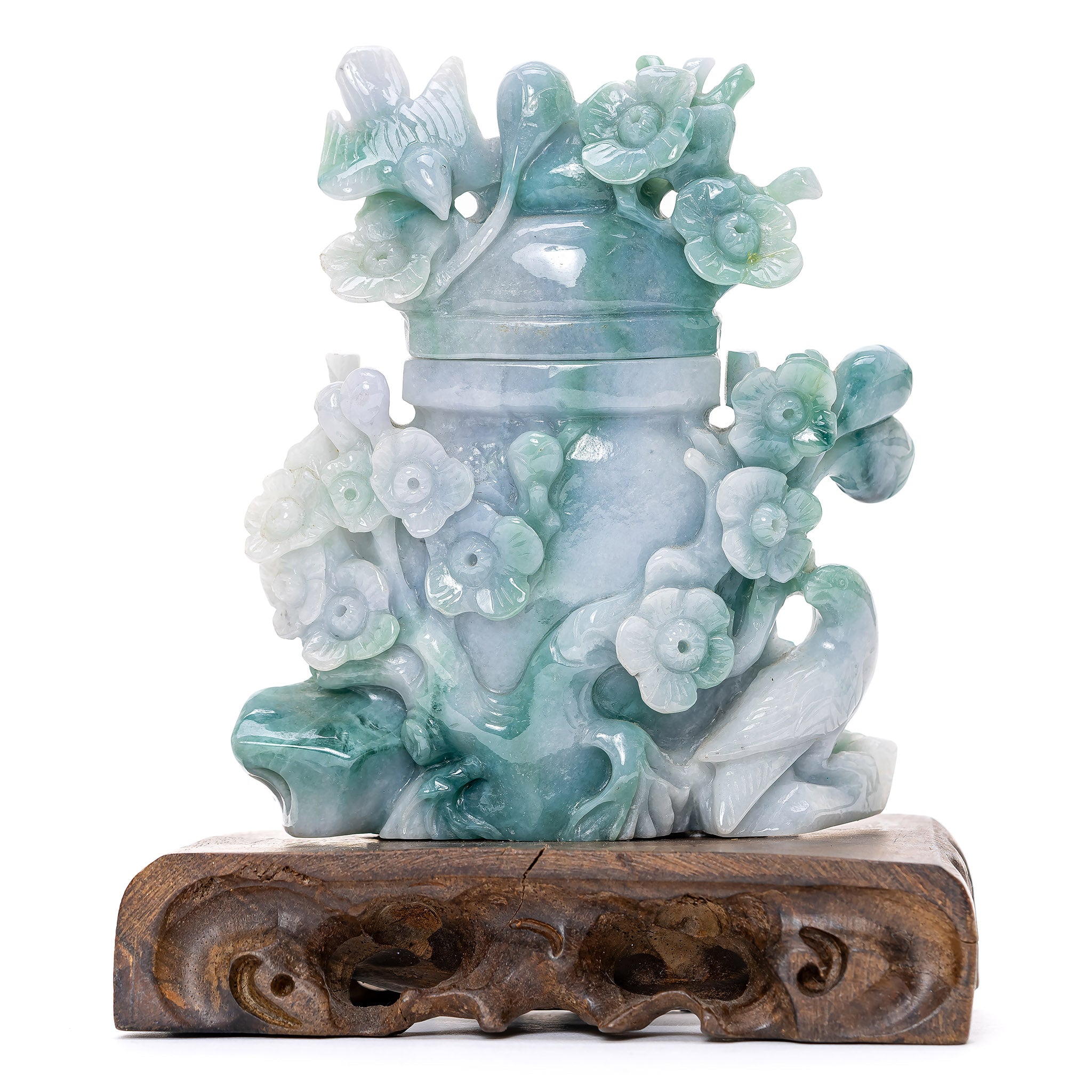 Discover the Essence of Artistry with our Jade Vase & Cover - Blooming ...